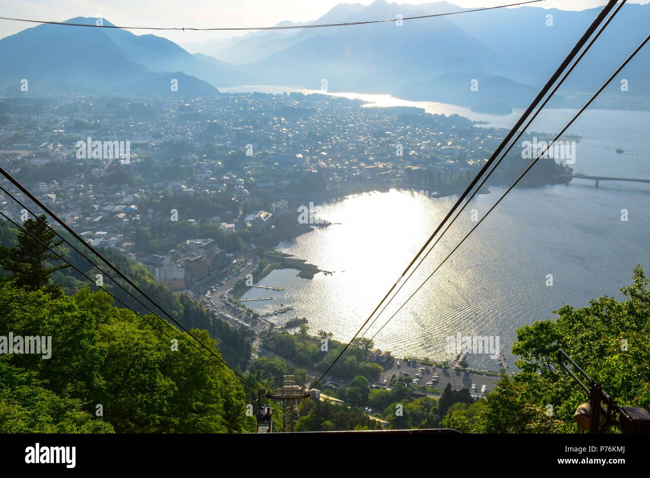 Kachi Kachi Ropeway going up to mount Tenjo Yama`s peak towards lake Kawaguchiko in Yamanashi ...